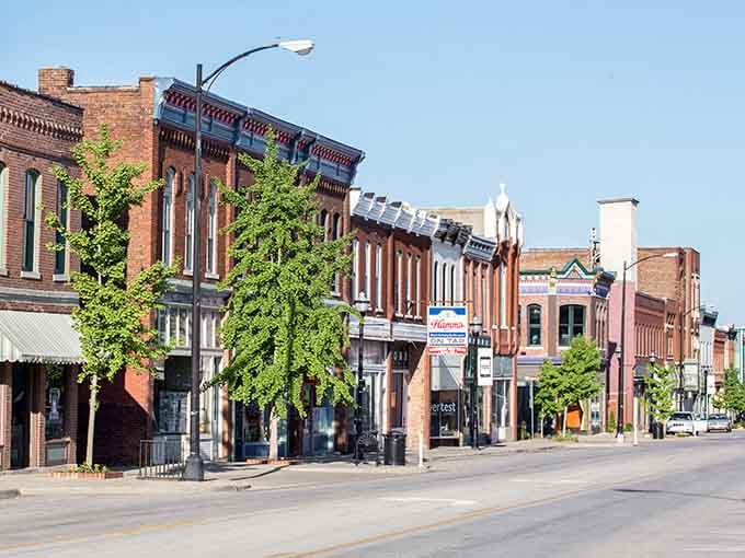Summer green trees frame these historic buildings where generations of families have shopped and gathered together.