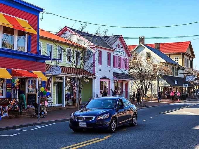 Classic storefronts stand shoulder to shoulder like they're posing for a Norman Rockwell painting.