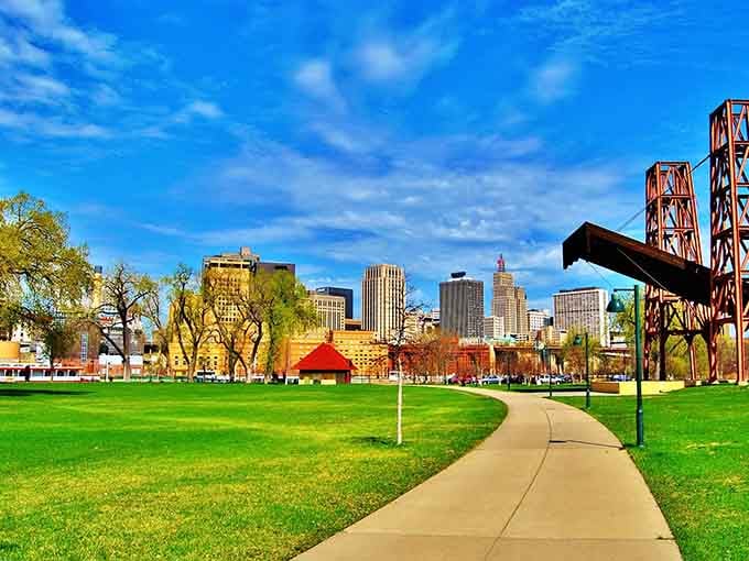 Green spaces stretch toward the city skyline, offering the perfect balance between urban buzz and peaceful retreat.