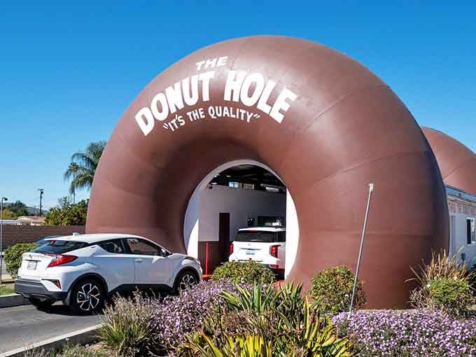 Driving through a giant donut is pure California roadside magic that makes every visit feel like childhood again.