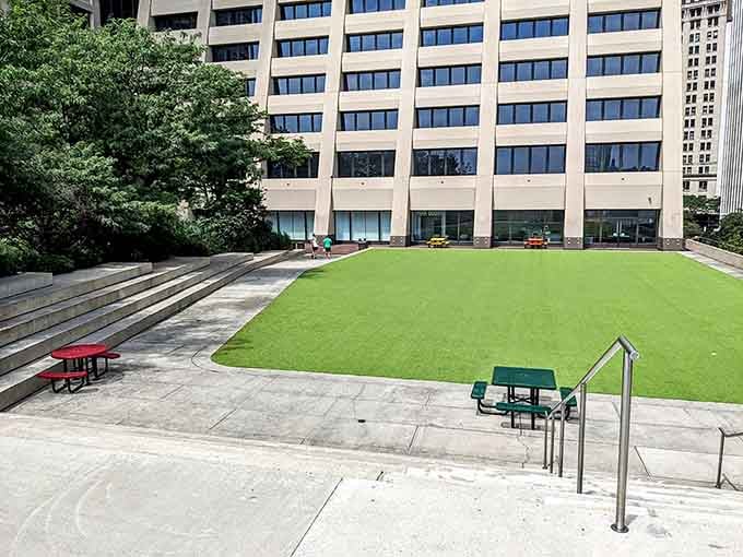 A perfect lawn floating above the city streets, because sometimes grass needs a better view than we do.