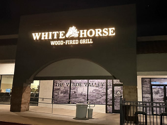 That glowing horse logo promises wood-fired flavors that'll make you forget all about gas grills and their boring ways.