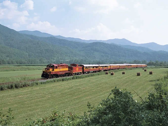 Rolling through farmland with mountains as a backdrop, this train ride delivers scenery that belongs in a coffee table book.