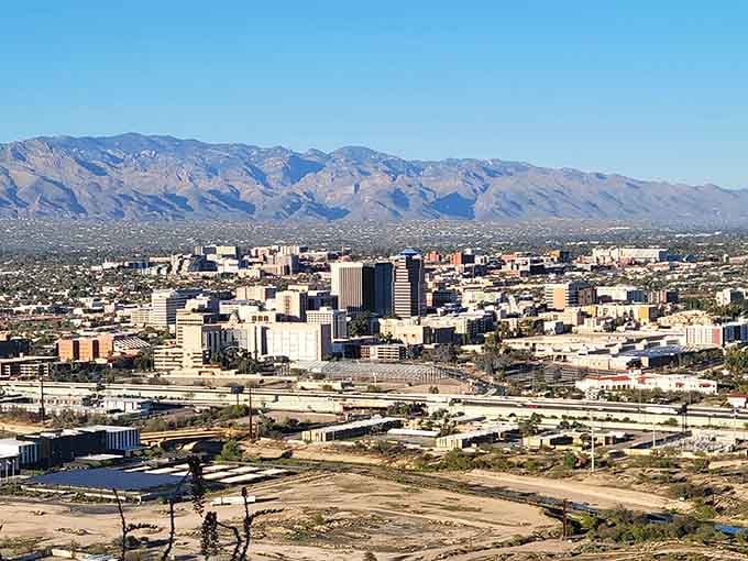 Mountains embrace the city skyline in a view that makes you want to grab your camera immediately.