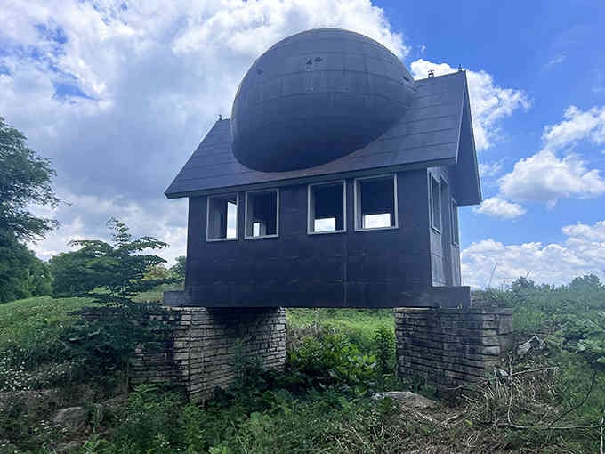 This mysterious dark structure perched on ancient earthworks looks like something from a Tim Burton film set in Ohio.