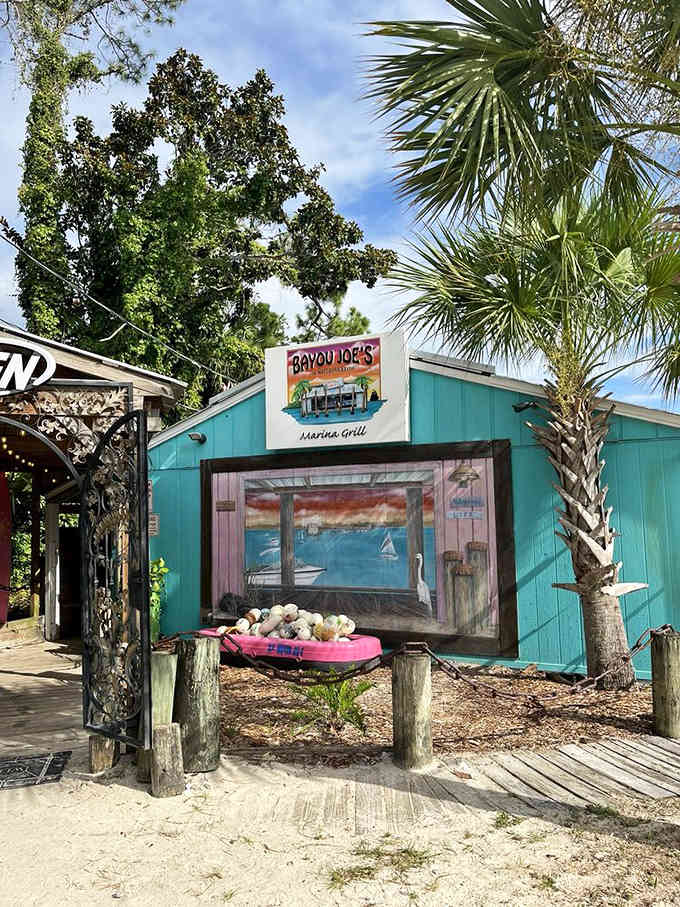 That turquoise building with palm trees could be a movie set for the perfect beach town restaurant.