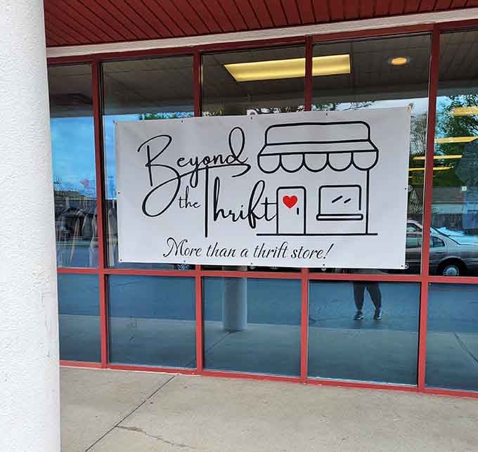 That charming window sign with its little heart reminds us thrift shopping supports wonderful community causes.