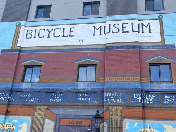 The vintage lettering and playful architecture make you smile before you even step through the door to see thousands of bikes.