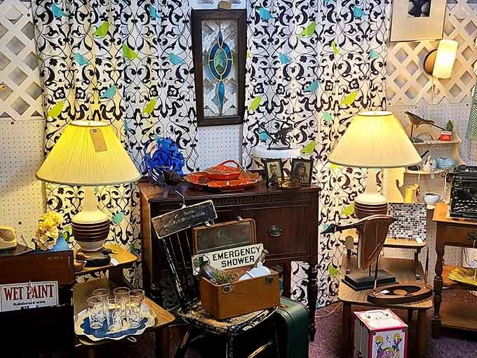 Vintage lamps glow warmly against bold wallpaper, creating a display that would make any decorator's heart skip.
