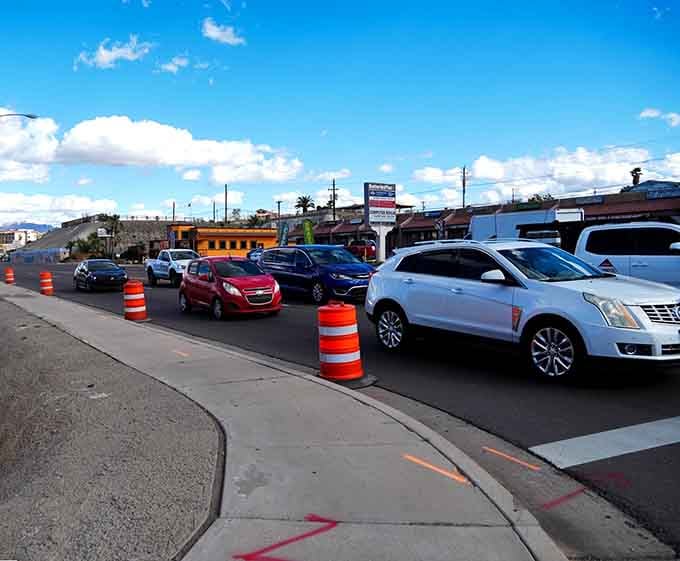 Traffic flows steadily through town, where construction cones signal growth and the promise of continued community investment and improvement.