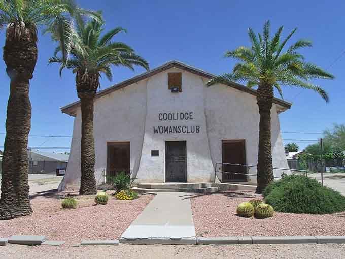 Palm trees flanking the historic Woman's Club building add unexpected tropical flair to desert living.