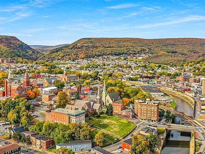 Autumn paints this valley town in warm colors, where brick buildings and tree-lined streets whisper tales of America's industrial heritage.