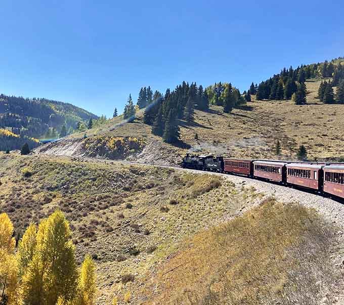 Autumn gold splashed across the hillsides while this beauty chugs through&mdash;Mother Nature showing off for the passengers again.