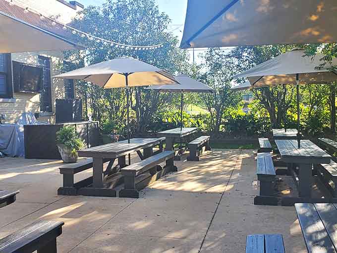 String lights and picnic tables create the perfect outdoor oasis for lingering over good food and better company.