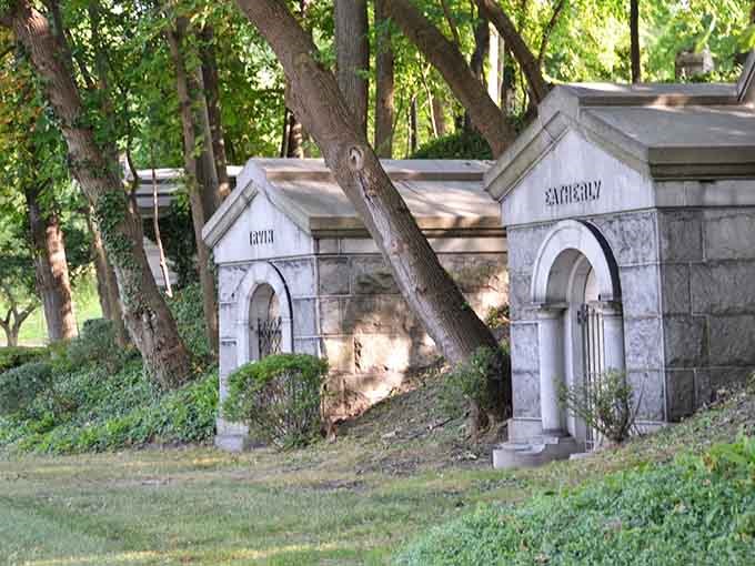 These weathered family mausoleums nestle into the hillside like miniature stone houses for eternal residents.