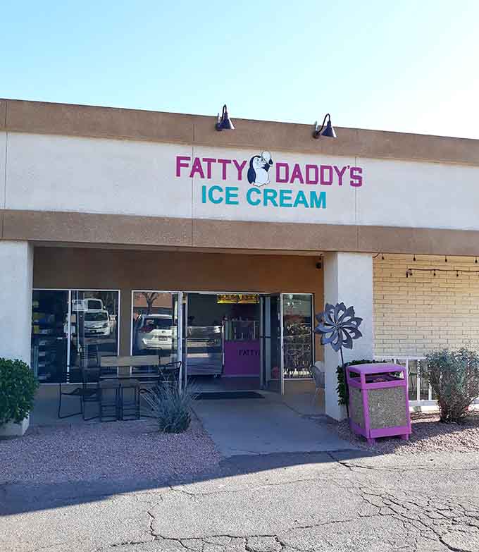 The cheerful penguin logo and purple accents hint at the creative frozen flavors waiting to cool you down inside.