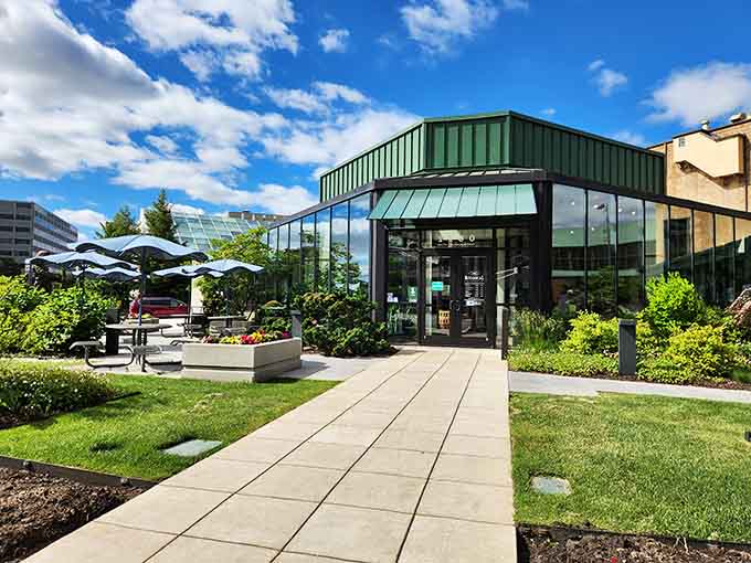 That welcoming entrance promises an escape from winter's grip into a world where palm trees thrive year-round.
