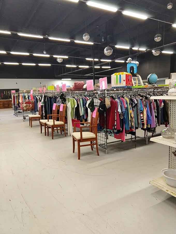 Those disco ball lights add unexpected glamour to racks bursting with colorful finds that spark joy and conversation.