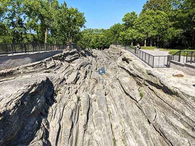 The grooves stretch endlessly, smooth and dramatic, showing the raw power of ice from thousands of years ago.