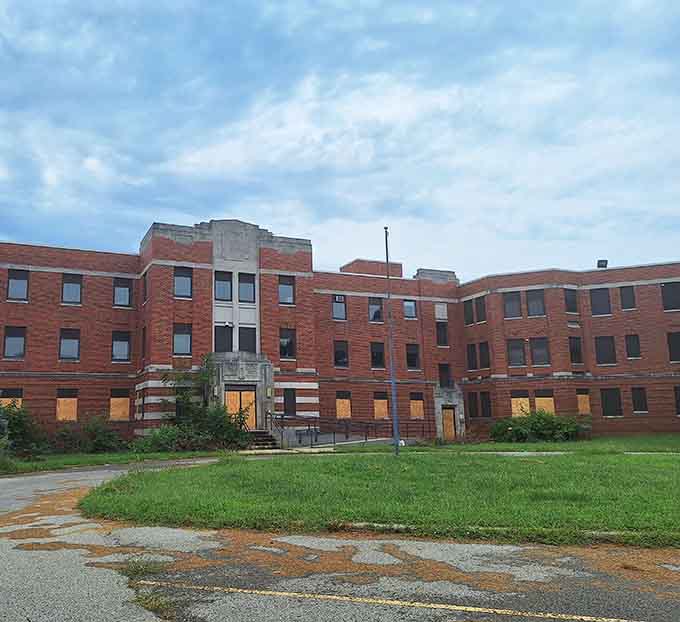 Those rows of windows once framed countless lives, each with their own heartbreaking story to tell.