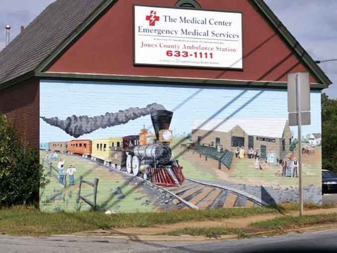 This beautiful mural celebrates railroad heritage, turning a simple wall into a window to the past.