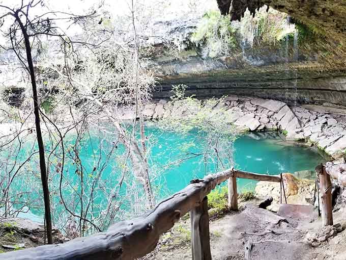 That turquoise water looks almost too perfect to be real, like someone Photoshopped paradise into the Hill Country.
