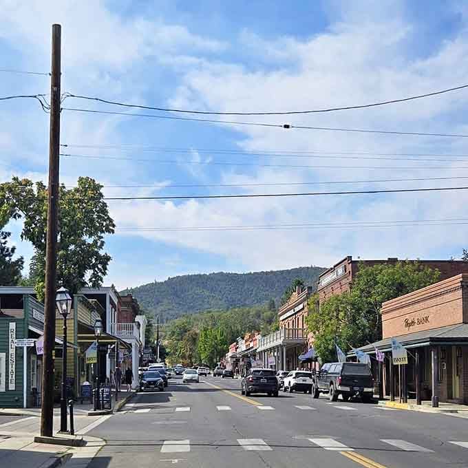 Mountains rise beyond this perfectly preserved downtown where history lives on every corner and in every doorway.