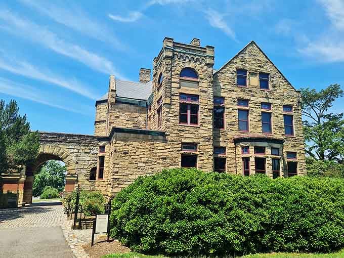 That honey-colored stone and castle-like tower could easily pass for an English manor house.