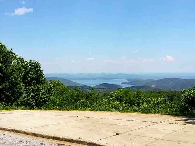From this overlook, the world spreads out below like a perfectly painted postcard you'd never believe was real.