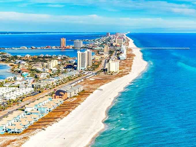 Miles of pristine coastline curve gracefully between Gulf and bay, creating a narrow paradise where both sides offer stunning views.