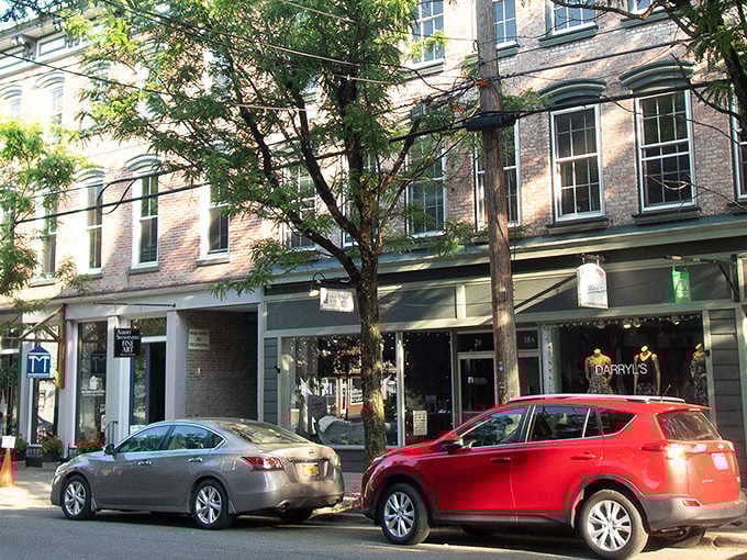 Leafy storefronts and brick buildings blend together like ingredients in your grandmother's secret recipe for charm.