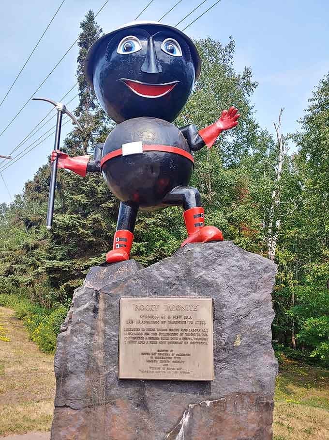 That commemorative plaque anchors Rocky's cheerful presence, honoring both industry and community spirit with equal enthusiasm.