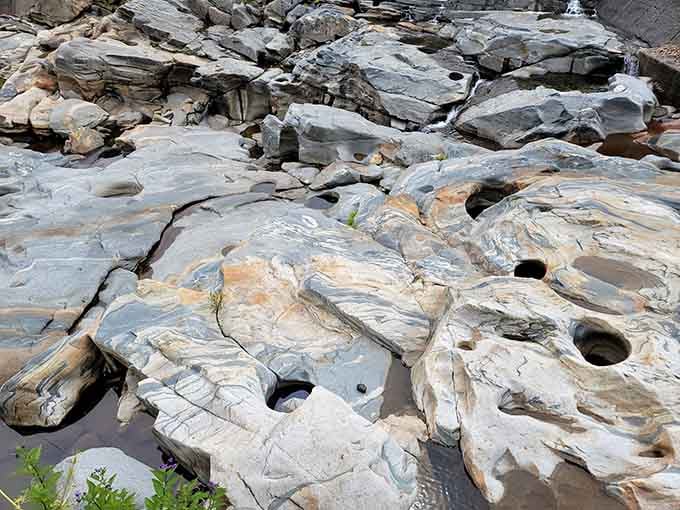 The swirling patterns in these glacial potholes prove that patience and persistence create the most remarkable beauty imaginable.