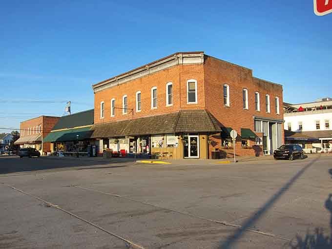 Golden evening light bathes these storefronts in warmth as the day winds down peacefully.