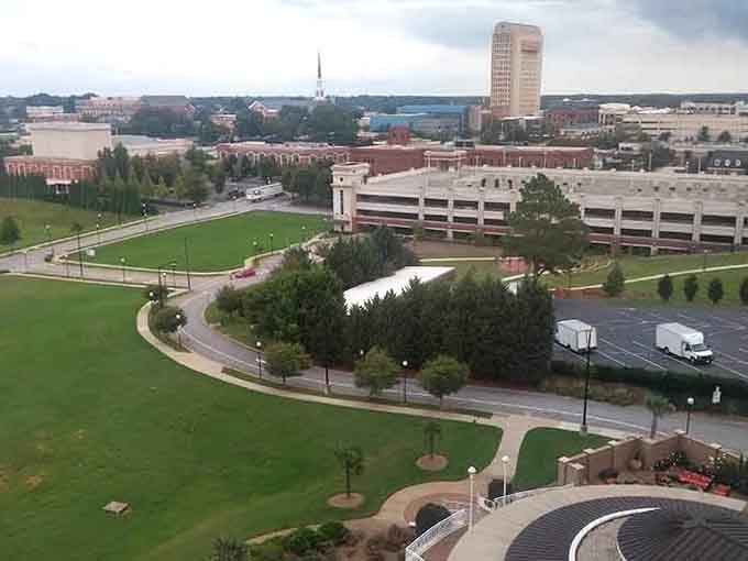 Green spaces curve through the urban landscape like nature's own design, offering peaceful spots to pause and breathe.