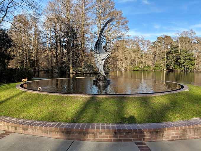 This whimsical topiary spirals skyward like a green tornado frozen mid-twist, defying gravity with pure artistic vision and patience.