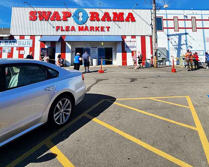 The bold red and white striped entrance welcomes bargain hunters to a world where deals are always waiting inside.