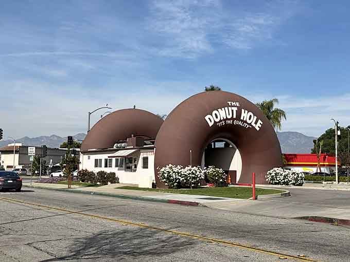Those massive brown donut arches have welcomed travelers for decades, turning a simple breakfast stop into unforgettable memories.