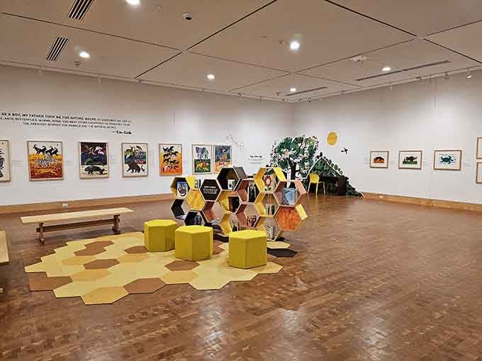 Honeycomb seating and bright illustrations create a space where The Very Hungry Caterpillar would feel right at home.