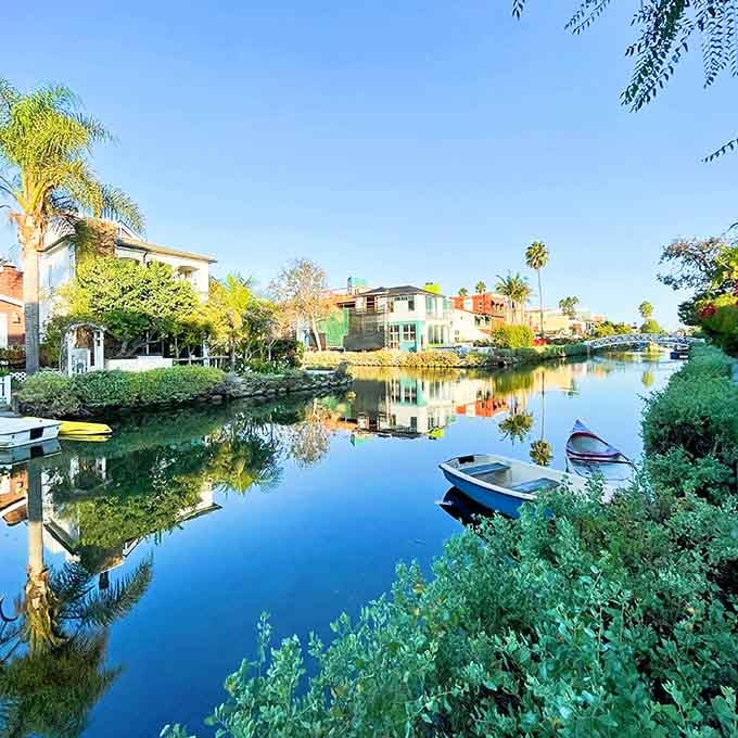 Mirror-perfect reflections double the beauty as boats rest quietly along these hidden waterways that time forgot.