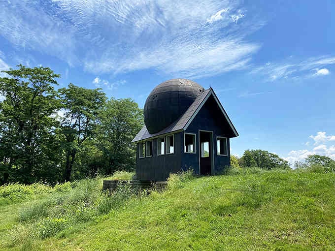 Surrounded by wildflowers and summer greenery, the Watch House sits peacefully atop history that stretches back thousands of years.