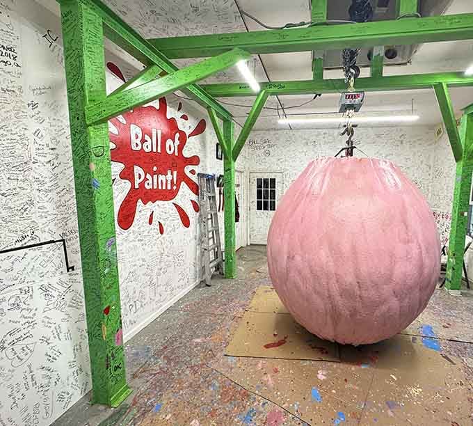The pink-painted ball hangs ready for your contribution, inviting you to become part of this growing record.
