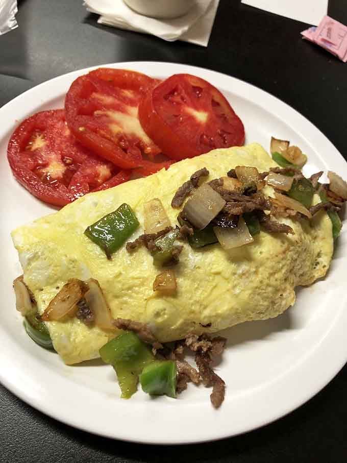 This fluffy omelet loaded with peppers and beef shows why eggs are the ultimate breakfast canvas.