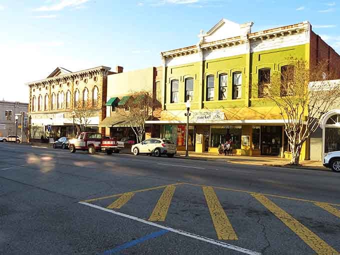 Yellow buildings and wide sidewalks create a downtown where window shopping doesn't require an engineering degree to navigate safely.