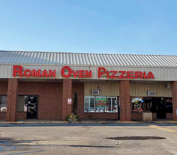 That retro neon sign practically screams "authentic pizza inside," and who are we to argue with such confident signage?