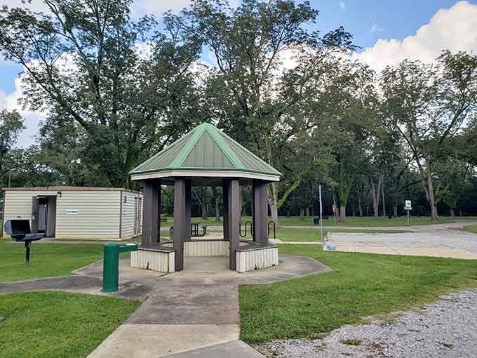 Peaceful pavilions and brick walkways create the kind of spot where stress goes to die a quiet death.