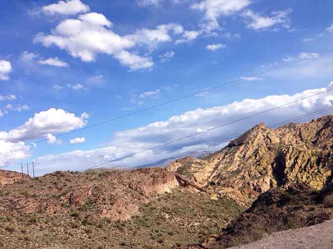 The road less traveled looks pretty darn good when it's framed by mountains that remember dinosaurs.