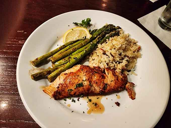 That salmon's crispy skin and those asparagus spears are proof that simple done right beats fancy done wrong.