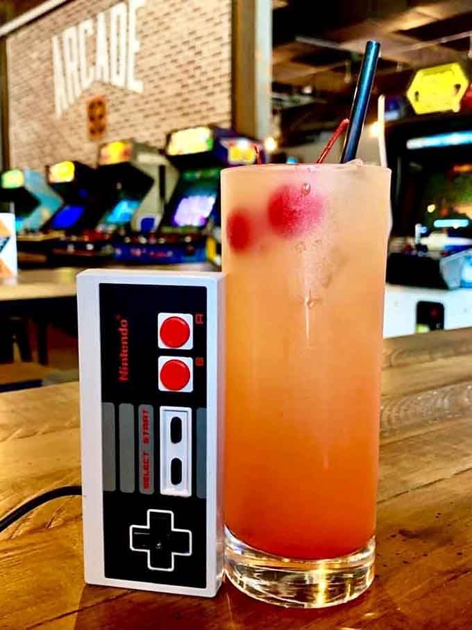This sunset-hued cocktail paired with a vintage controller is basically adulting done right, wouldn't you say?