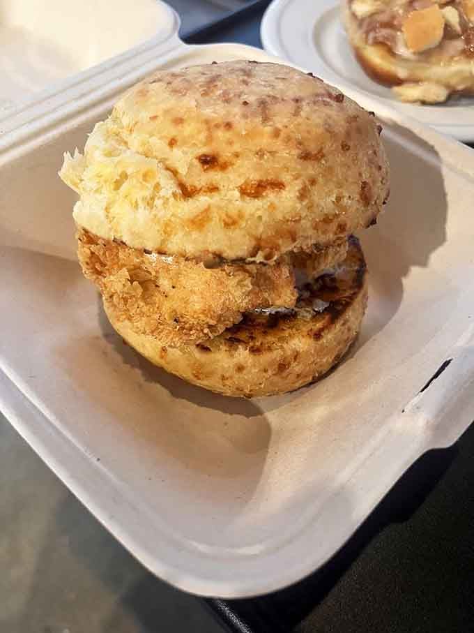 Southern hospitality stacked between two buttery biscuit halves, because sometimes simple combinations create the most memorable meals.